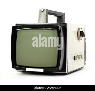 Vintage small portable color TV set with radio on white background ...