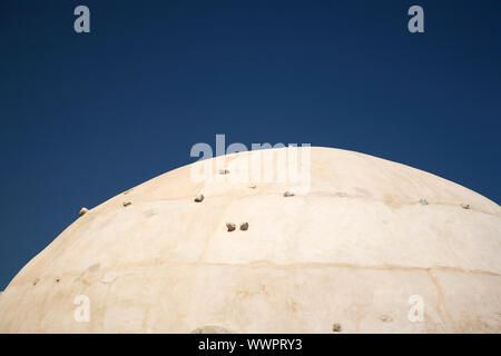 pale cupola with stones and a dark blue sky Stock Photo - Alamy