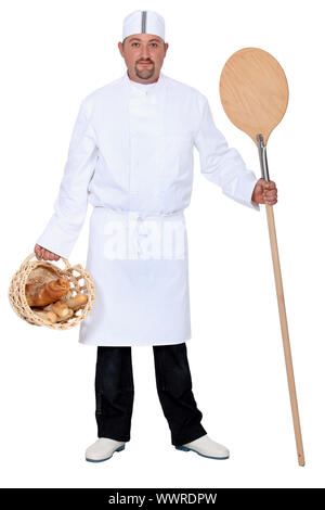 Baker with basket and paddle Stock Photo - Alamy