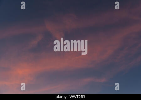 The sky and the clouds are dyed red in a sunset Stock Photo - Alamy