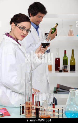 Oenologists analysing a wine Stock Photo - Alamy