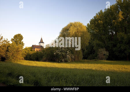 landscape of Merkenich district with St. Brictius church, Cologne ...