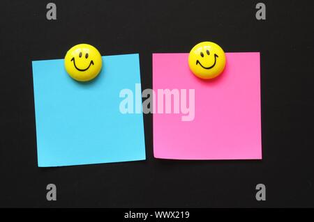smilie or smily with empty sheet of paper and copyspace Stock Photo - Alamy