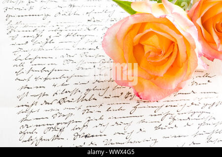 Red rose over a hand written love letter Stock Photo - Alamy