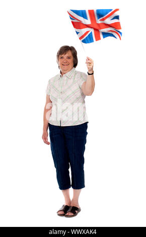 Senior woman holding waving fan on a hot summer day Stock Photo - Alamy