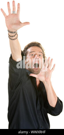 Scared man reaching up over white background Stock Photo - Alamy