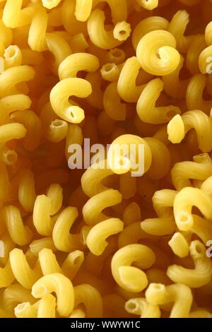 Bulk whole wheat pasta Stock Photo - Alamy