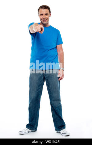 Handsome smiling man pointing straight at you Stock Photo - Alamy
