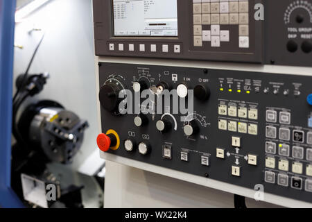 CNC lathe machine control panel. Selective focus Stock Photo - Alamy