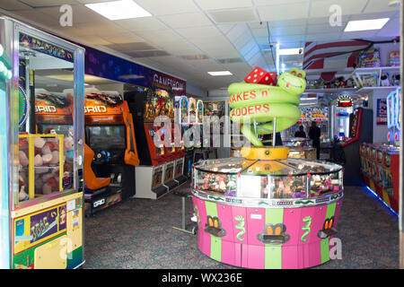 a colourful seaside amusement arcade on seafront at Bognor regis, west ...
