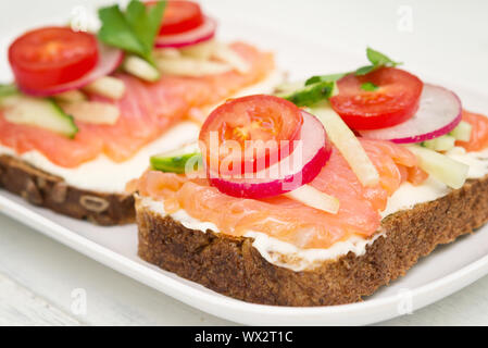 Sandwiches with rye bread, soft cheese, and raspberry Stock Photo - Alamy
