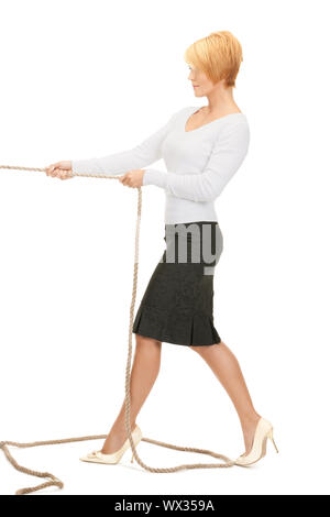 bright picture of business woman pulling rope Stock Photo - Alamy