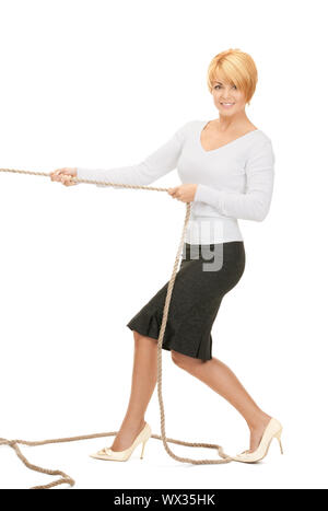 bright picture of business woman pulling rope Stock Photo - Alamy