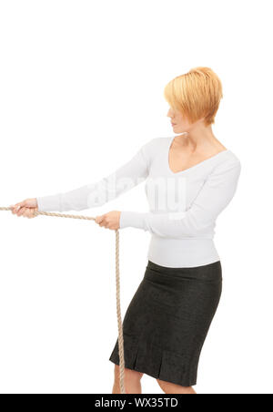 bright picture of business woman pulling rope Stock Photo - Alamy