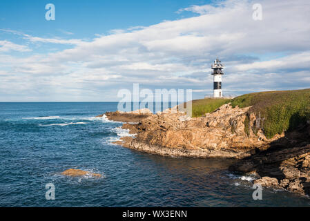 Beautiful Isla Pancha lighthouse in the town of Ribadeo, Galicia, Spain ...