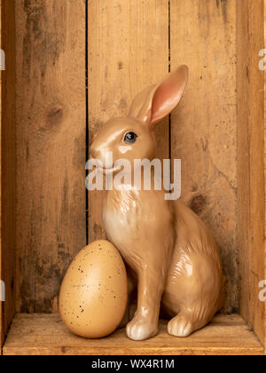 An Easter nest with Easter eggs and Easter bunny figure is hidden along ...