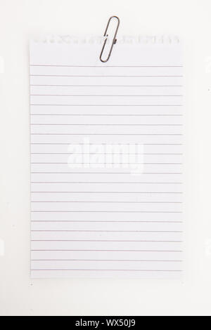 Blank page with grey paperclip against a white background Stock Photo ...