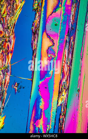 Urea crystals under the microscope and in polarized light Stock Photo ...