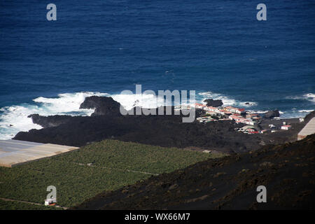 Beach and settlement Punta Larga Stock Photo - Alamy