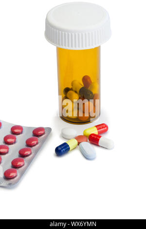 Color pills with box pills and serynge Stock Photo - Alamy