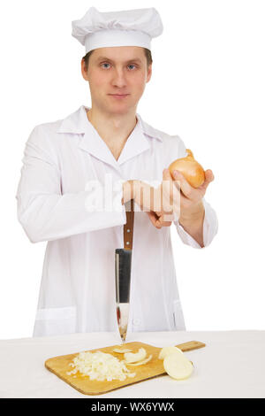 Cook in white overall with knife and preparation board on a white ...