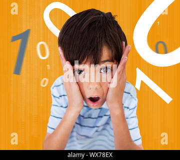 Boy looking scared against orange background with numbers Stock Photo ...