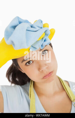 Woman wiping the sweat off her head Stock Photo - Alamy