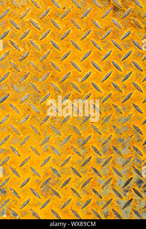 Yellow steel diamond plate background Stock Photo - Alamy