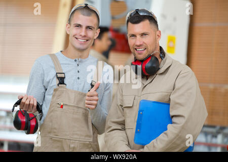 happy carpenter is enjoying his work Stock Photo - Alamy