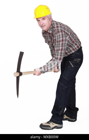 A MIDDLE AGED MINER WITH SAFETY HELMET AFTER SHIFT Stock Photo - Alamy