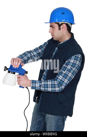 Spray gun isolated over a white background Stock Photo - Alamy