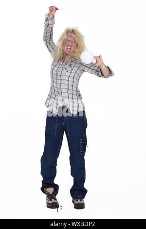 Woman getting an electric shock Stock Photo - Alamy