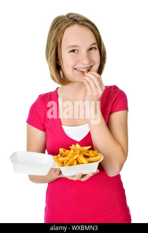Teenage eating french fries isolated on white background Stock Photo ...
