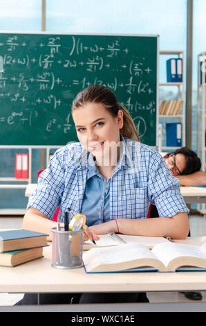 Young students taking the math exam in classroom Stock Photo - Alamy