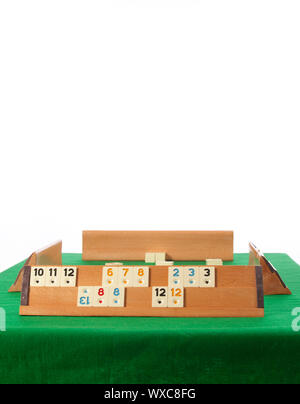 empty rummy table over green background Stock Photo - Alamy