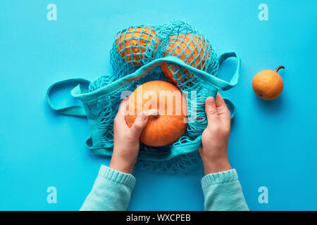 Flat lay. Putting on blue blade guards on white figure skates Stock ...