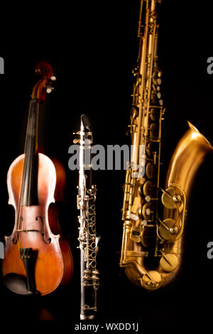 Music Sax tenor saxophone violin and clarinet in white background Stock ...