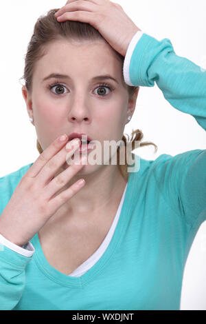 terror dread horror fearful scared man cover mouth Stock Photo - Alamy