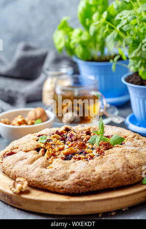 Walnuts on concrete background. Selective focus Stock Photo - Alamy