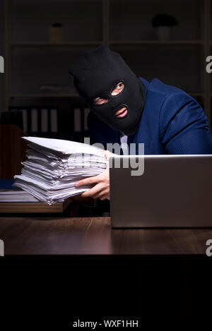 Employee Stealing Documents In Office Using Phone. Secret Theft Stock ...
