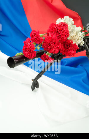 Machine Gun And Flowers Stock Photo - Alamy