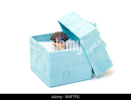 Cyan gift boxes with ring closeup on white background Stock Photo - Alamy