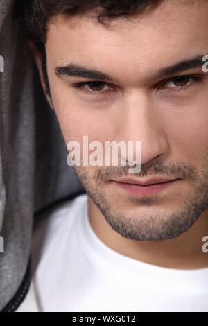 man look menacing intimidating facial expression Stock Photo - Alamy