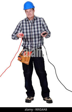 Electrician receiving an shock Stock Photo - Alamy