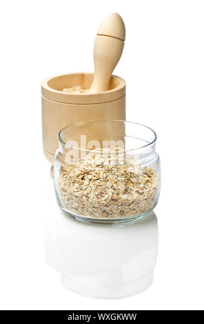 mortar and jar with cereal Stock Photo - Alamy
