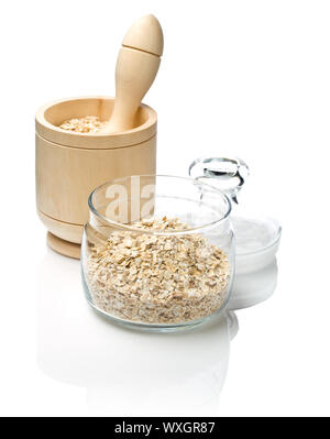 mortar and jar with cereal Stock Photo - Alamy