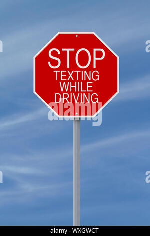 Stop texting while driving road sign on sky background Stock Photo - Alamy