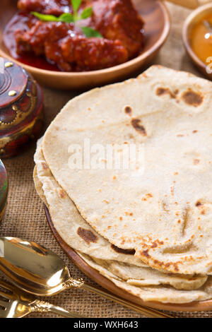 Chapati or chapatti, Indian dhal and chicken curry, popular Indian food ...
