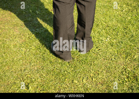 Bad fit suit Stock Photo - Alamy