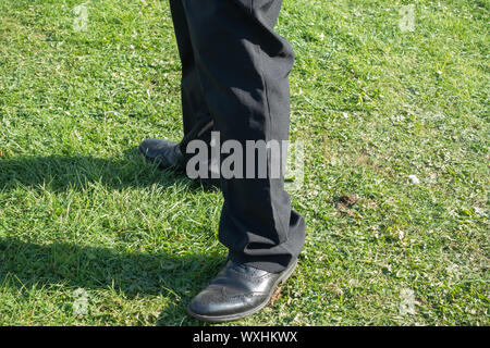 Bad fit suit Stock Photo - Alamy